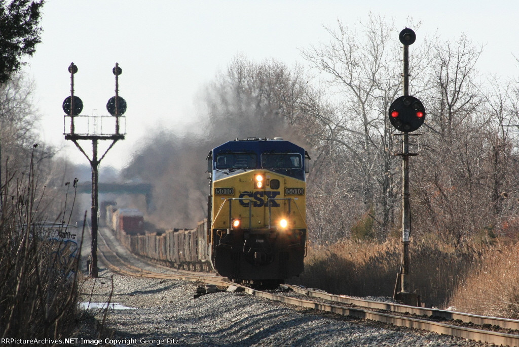 CSX 5010 and train Q410